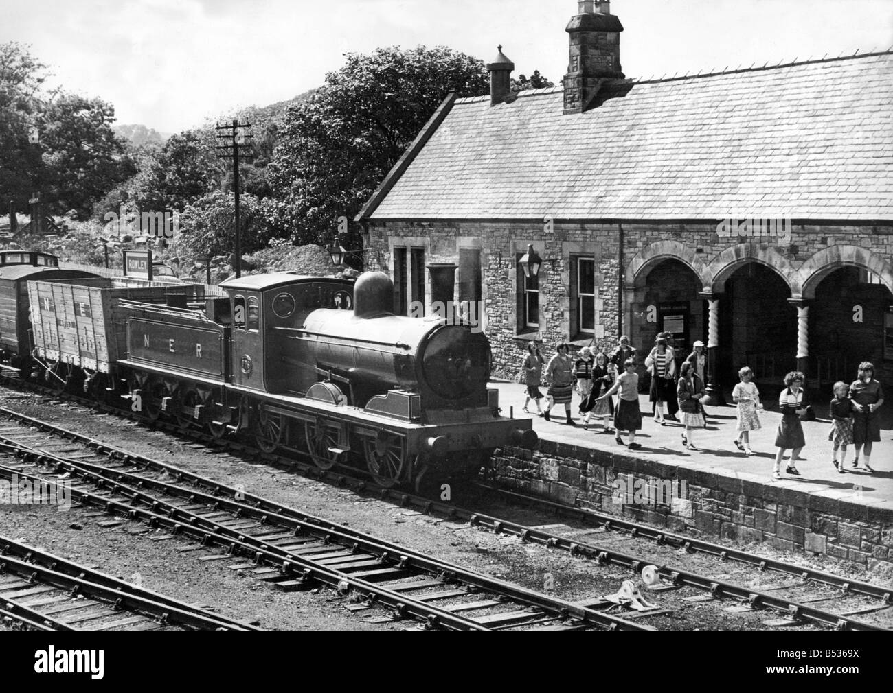 Boarding a train at the reconstructed Rowley Station at Beamish Open ...