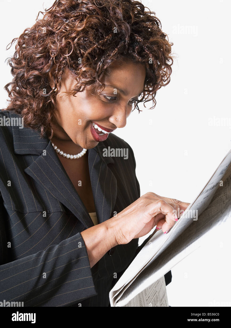 Woman reading newspaper profile hi-res stock photography and images - Alamy