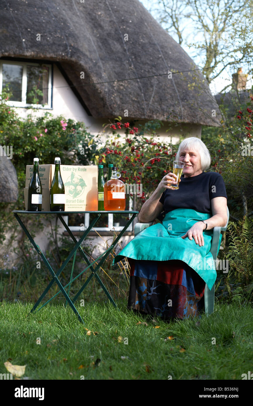Woman drinking Cider Stock Photo - Alamy