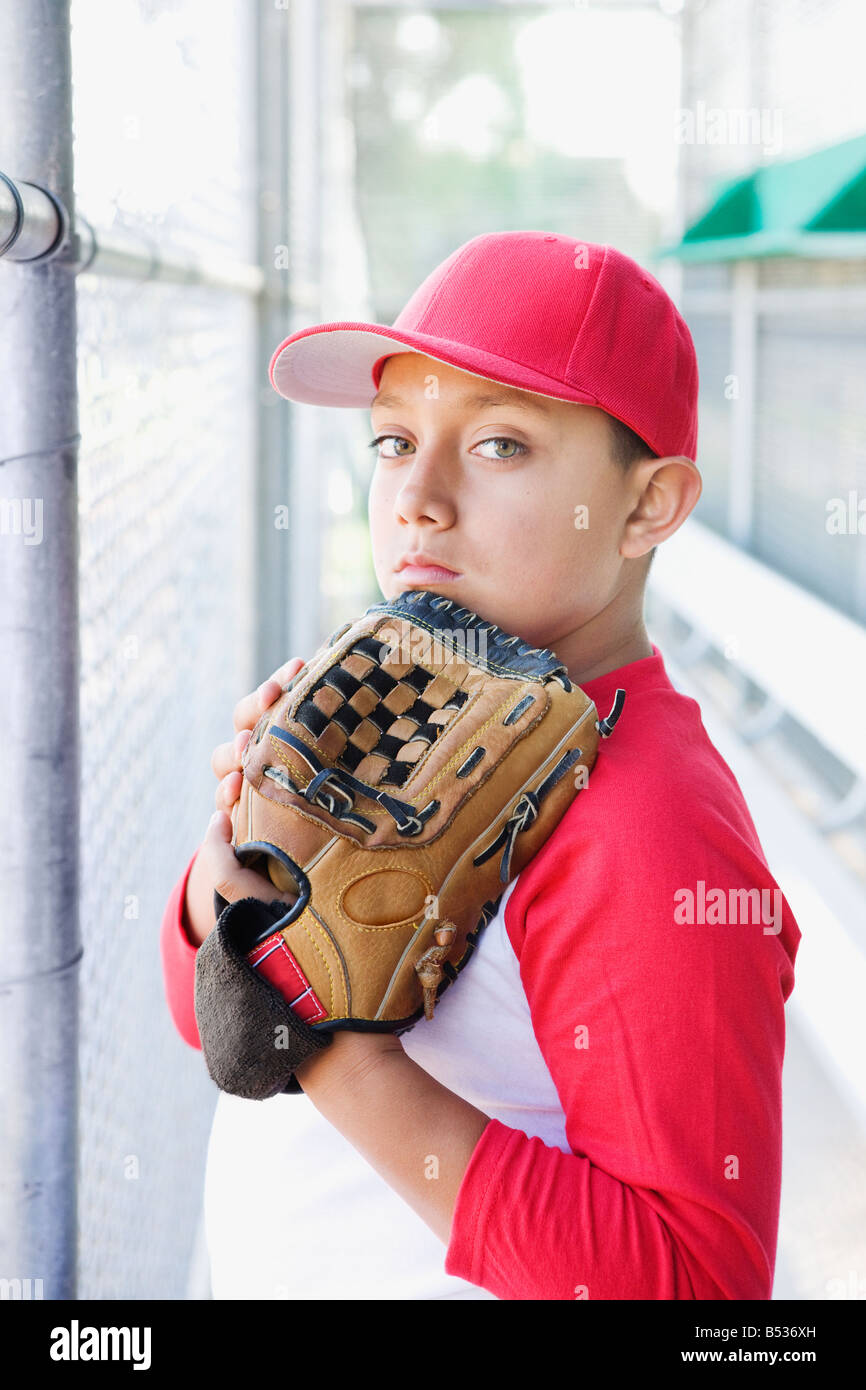 Hispanic boy in baseball uniform hi-res stock photography and images ...