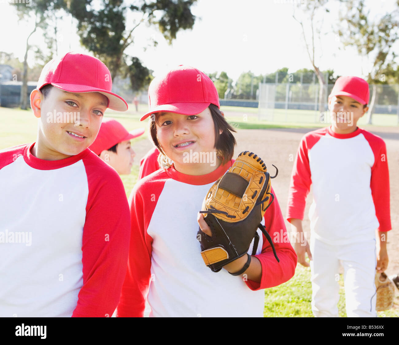 Hispanic boy in baseball uniform hi-res stock photography and images ...