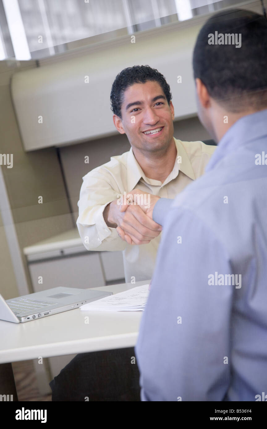 Over shoulder two businessmen talking hi-res stock photography and ...