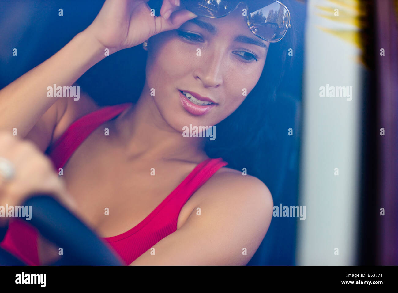 Hispanic woman driving car Stock Photo - Alamy