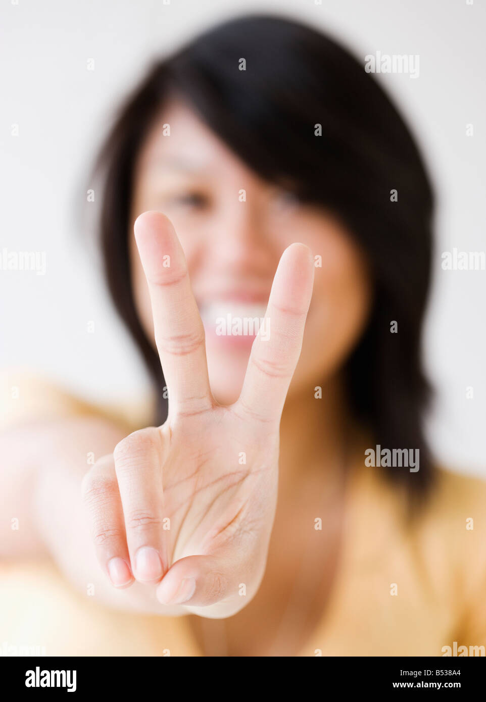 Asian peace sign hi-res stock photography and images - Alamy