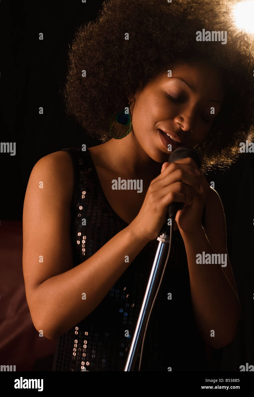 African woman singing Stock Photo - Alamy