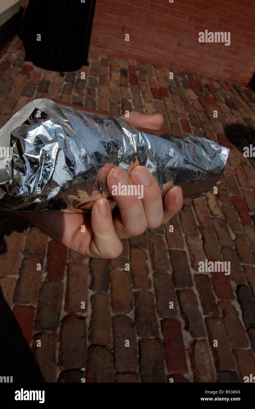 Wrap food in foil hi-res stock photography and images - Alamy