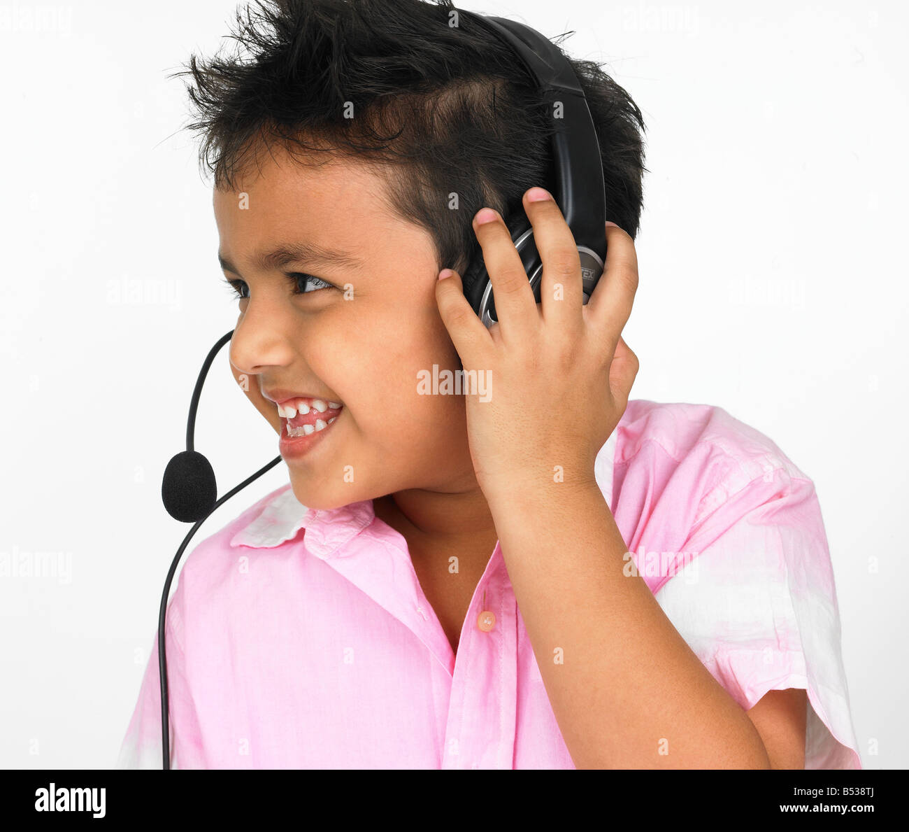 Boy talking into microphone hi-res stock photography and images - Alamy