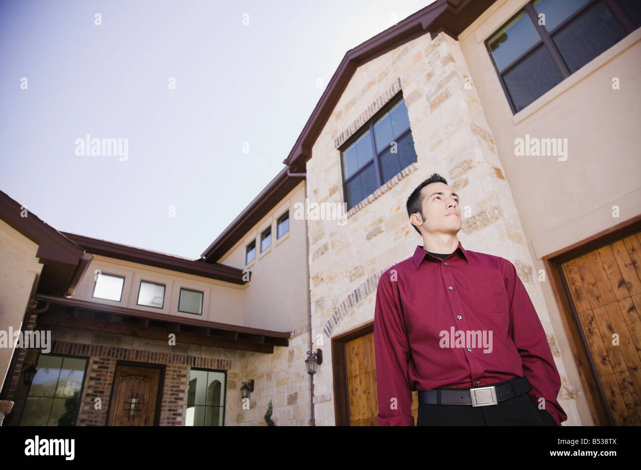 Man outside house hi-res stock photography and images - Alamy