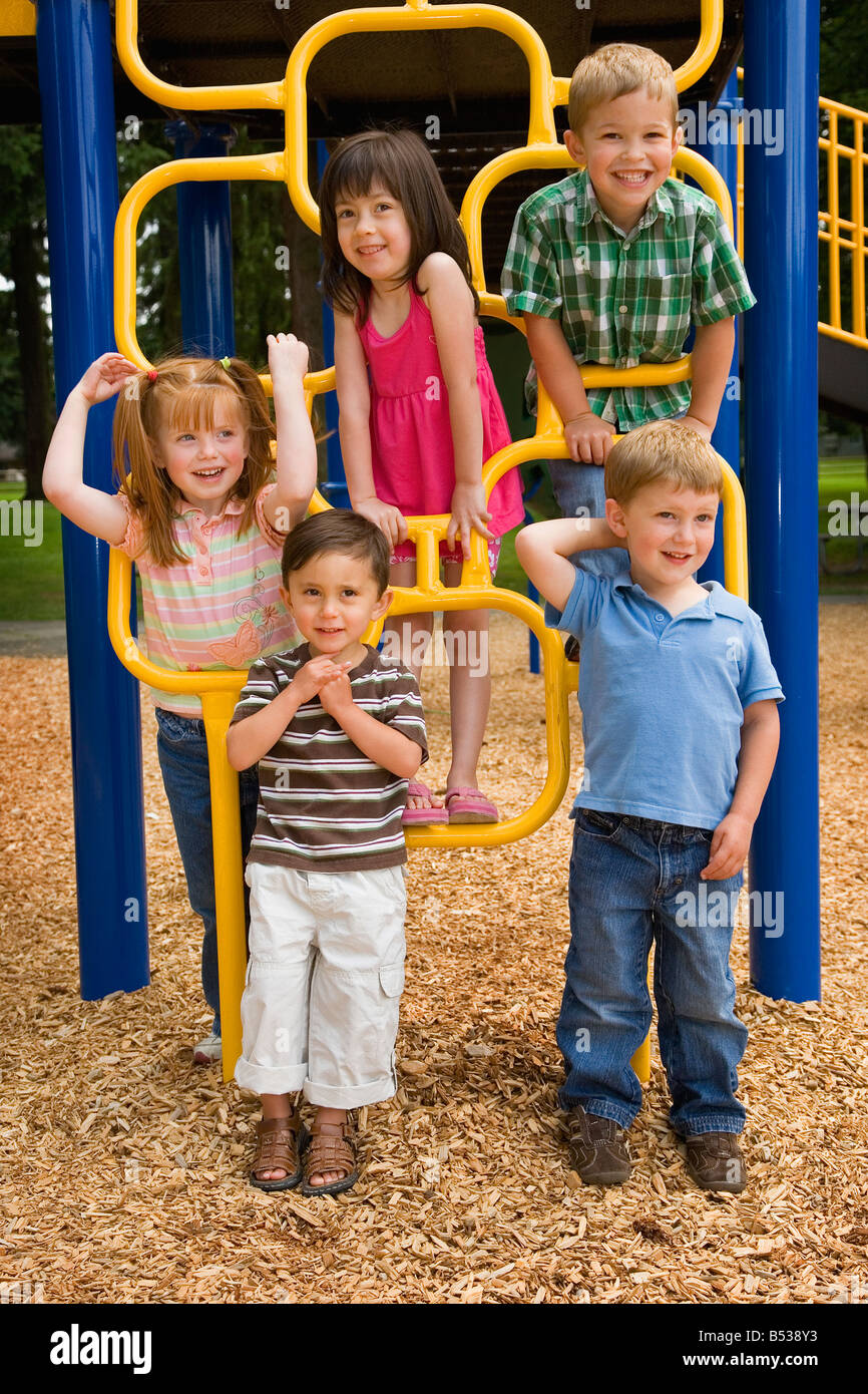 Children playing in playground Stock Photo - Alamy