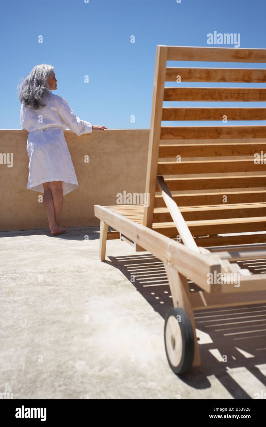 Leaning Over Balcony High Resolution Stock Photography and Images - Alamy