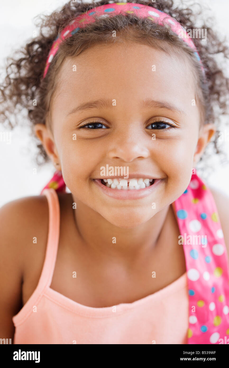 Close up of mixed race girl smiling Stock Photo - Alamy