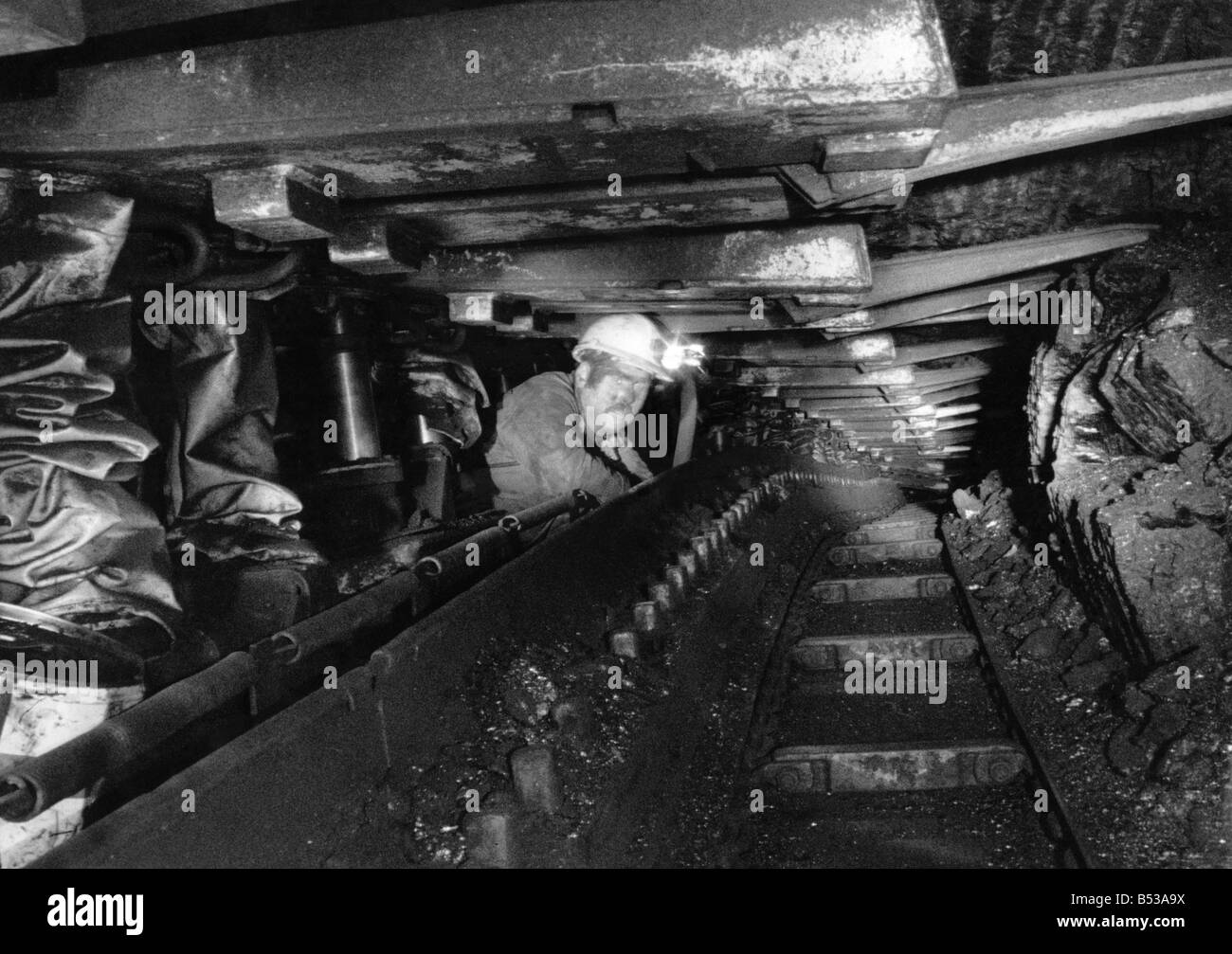A miner at work underground in a coal mine. August 1984 P017840 Stock ...
