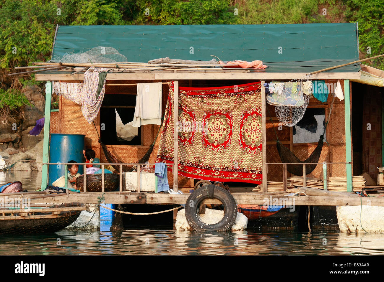 Floating village, Halong Bay, Gulf of Tonkin, Vietnam Stock Photo - Alamy
