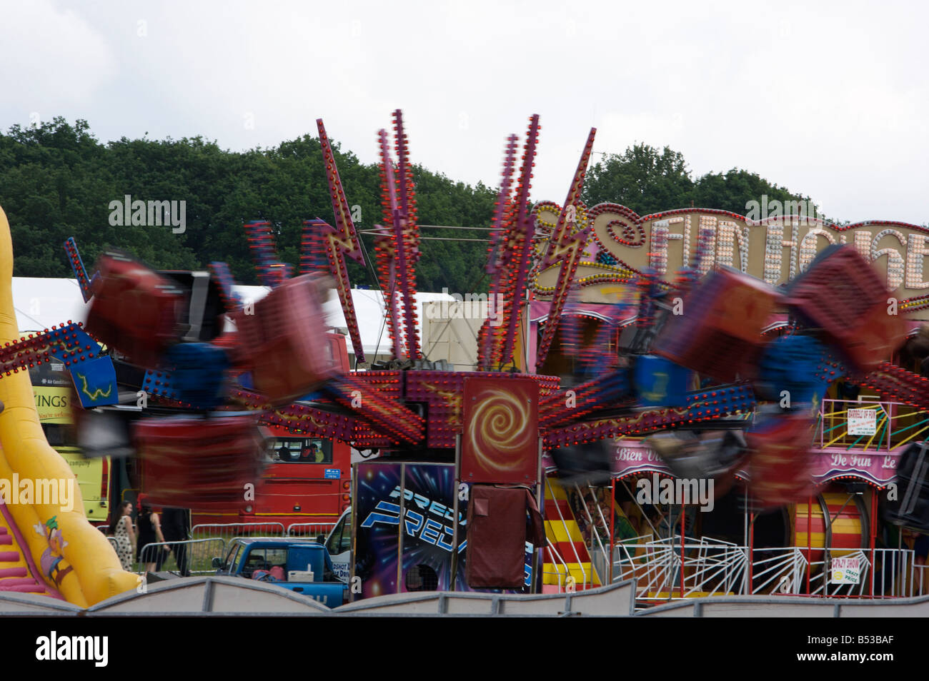 A funfair at Epsom racecourse Stock Photo - Alamy