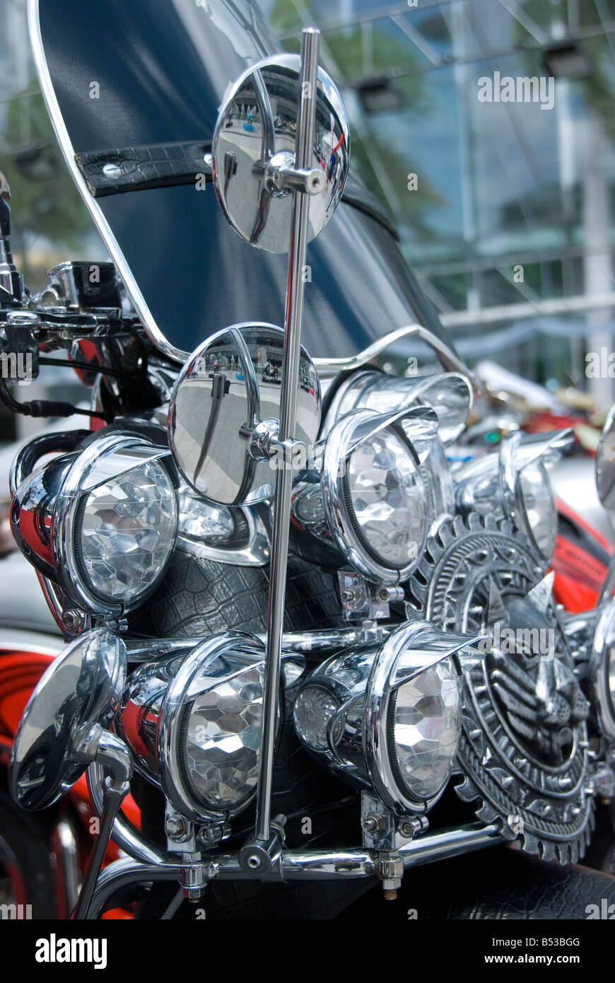 Custom built Yamaha Fino scooter with many headlights Stock Photo - Alamy