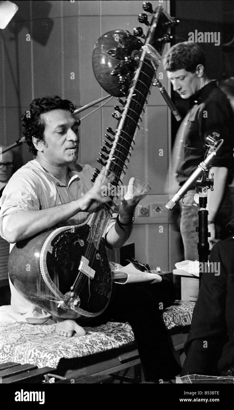 Ravi Shankar playing the sitar in a BBC sound studio at Television ...