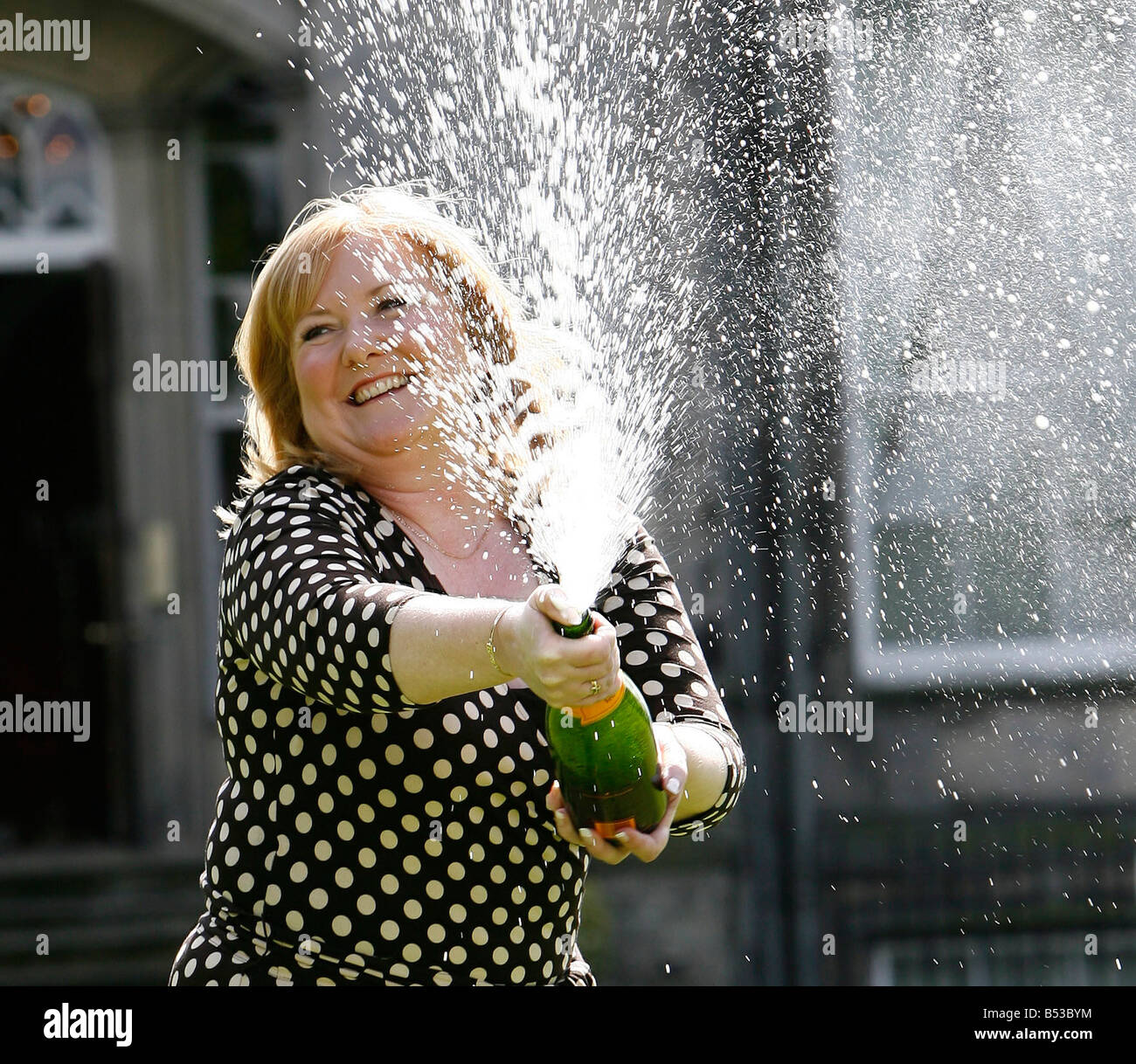 Record Euro Lottery winner Angela Kelly celebrates her win in front of ...