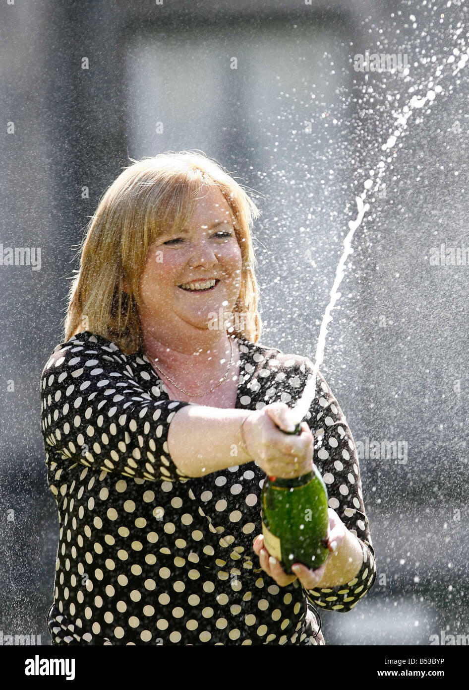 Record Euro Lottery winner Angela Kelly celebrates her win in front of ...