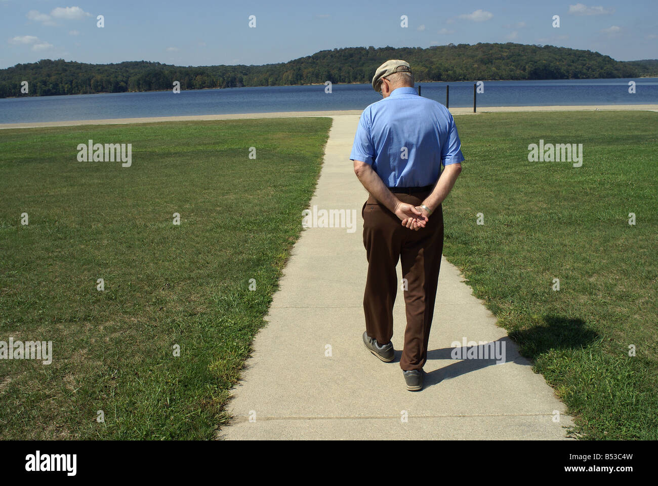 Walking looking down Stock Photo - Alamy