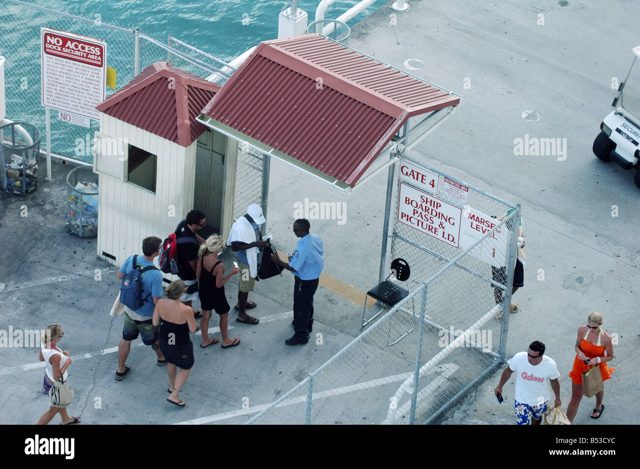 cruise ship passengers rushing to check in at customs gate to board ...