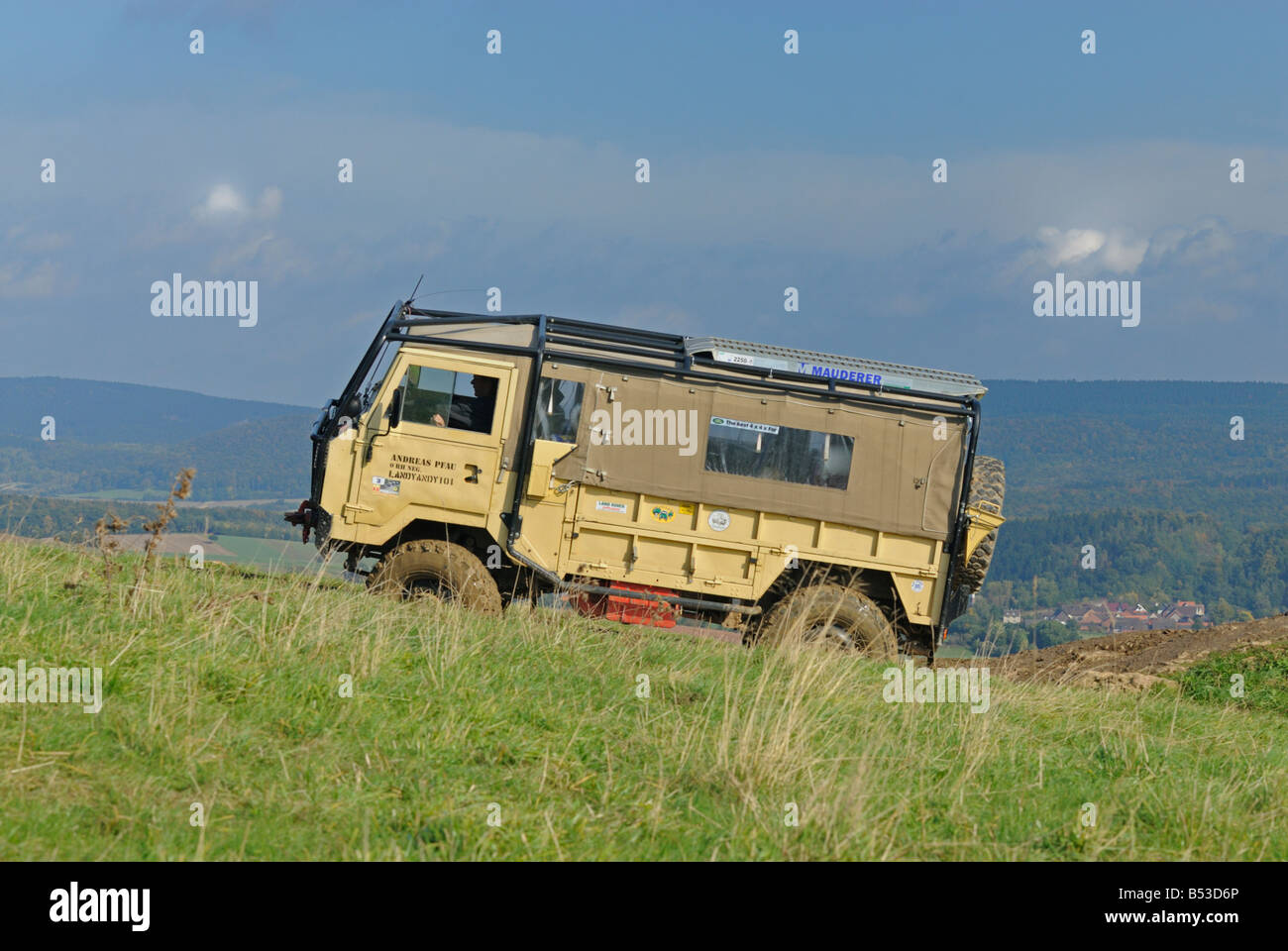 Ex-military 1970s Land Rover 101 Forward Control on a forest track in ...