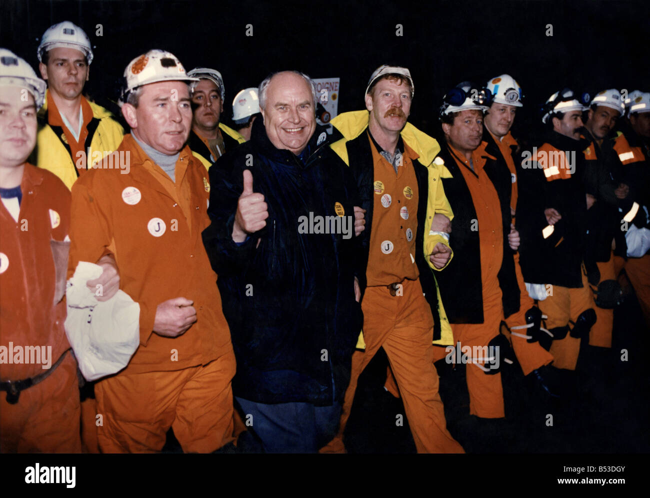 TUC leader Norman Willis flanked by miners during a coal miners march ...