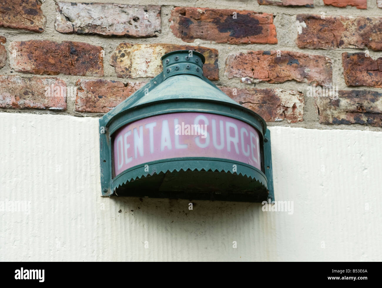 an illuminated dental surgery sign Stock Photo - Alamy