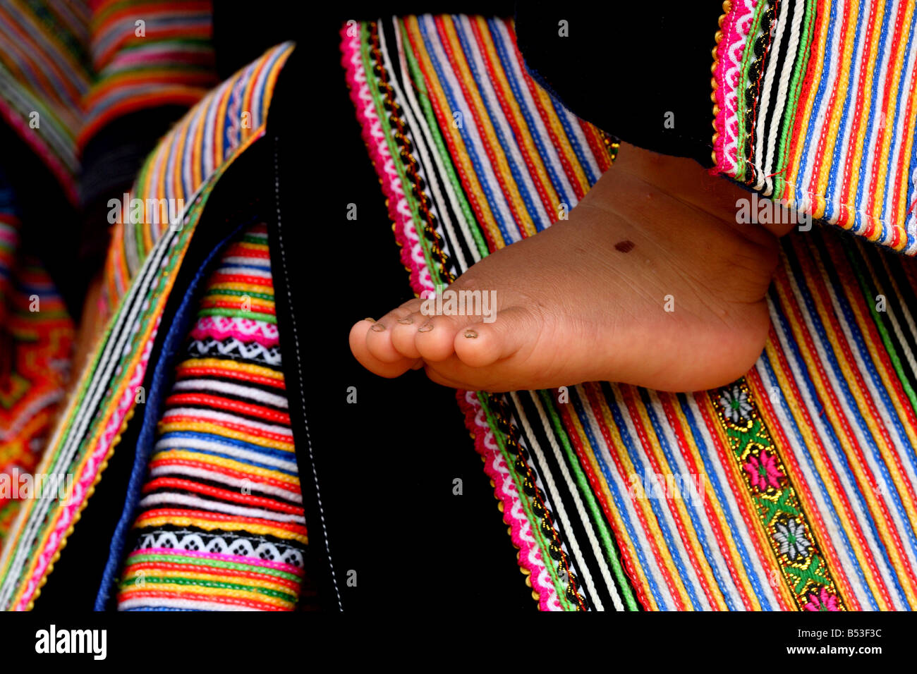Feet baby child Flower Hmong and mother Bac Ha Sunday Market Lao Cai ...