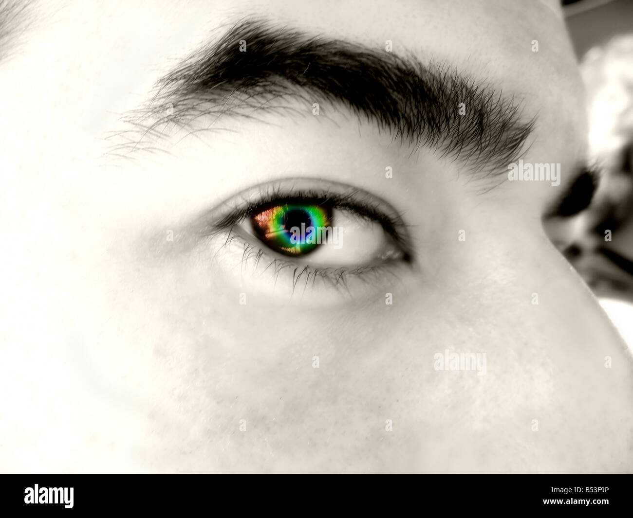 A rainbow colored man's eyeball color isolated over sepia tone Stock ...