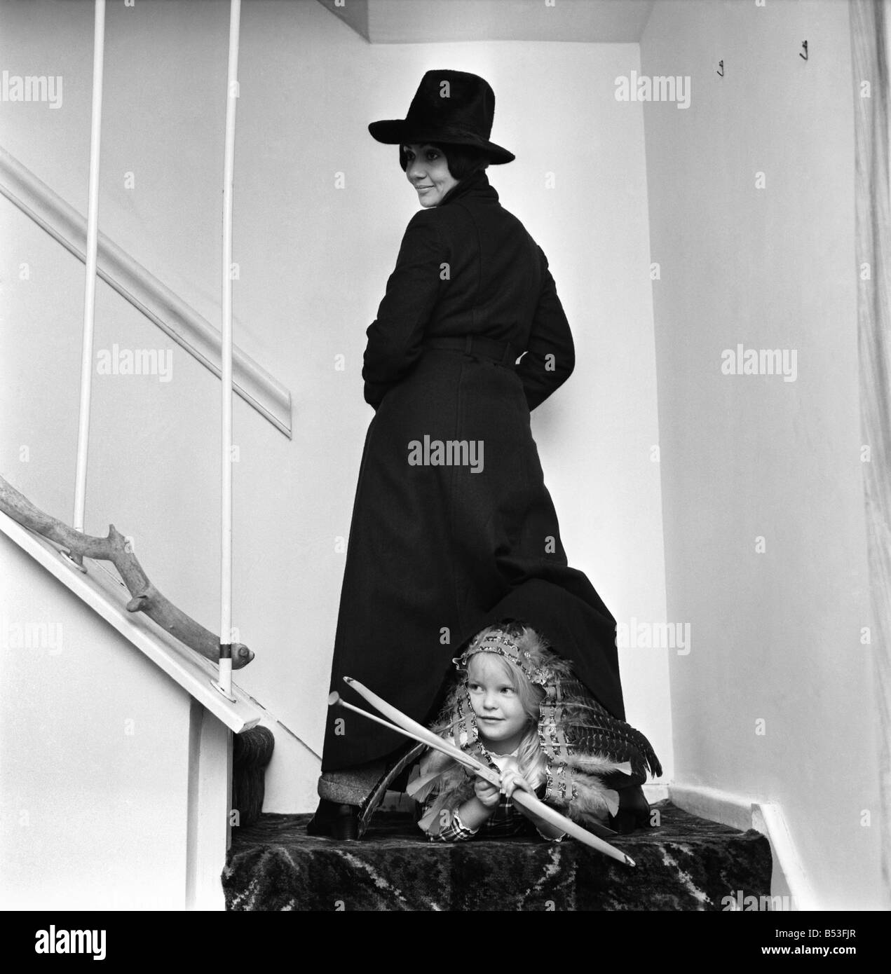 Clothing fashion. Model Ann Coates wearing a maxi coat. December 1969 ...