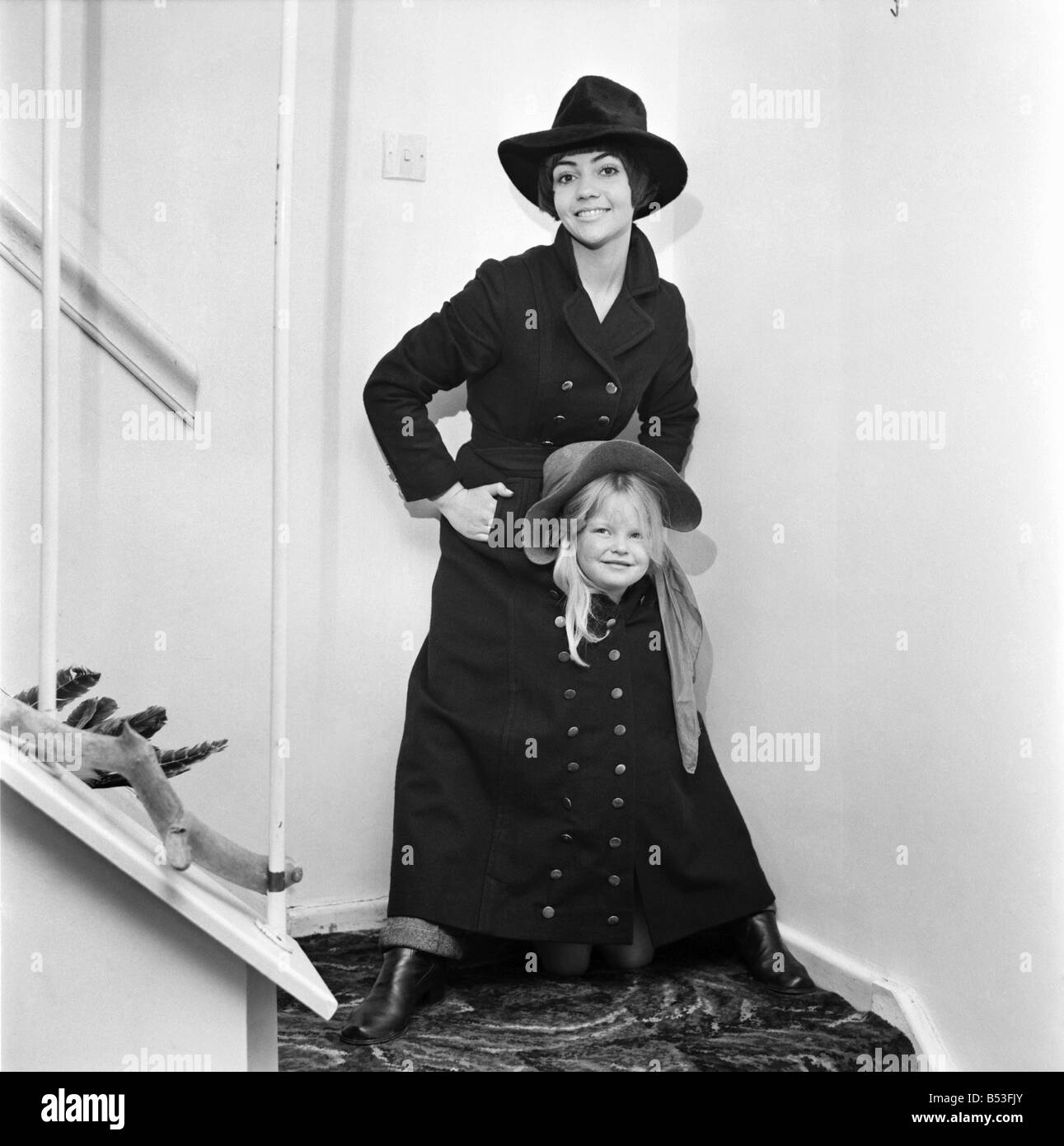 Clothing fashion. Model Ann Coates wearing a maxi coat. December 1969 ...