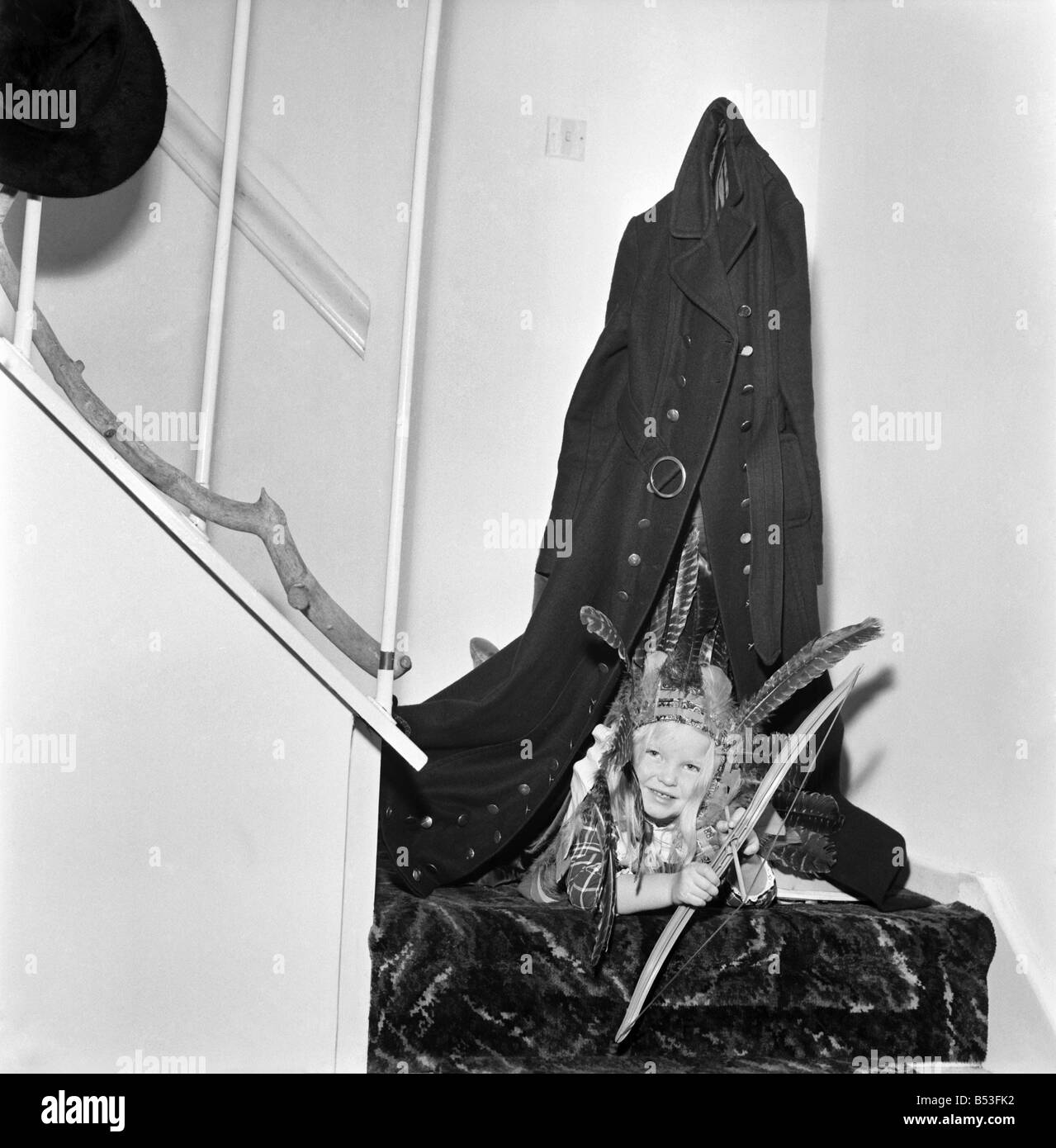 Clothing fashion. Model Ann Coates wearing a maxi coat. December 1969 ...