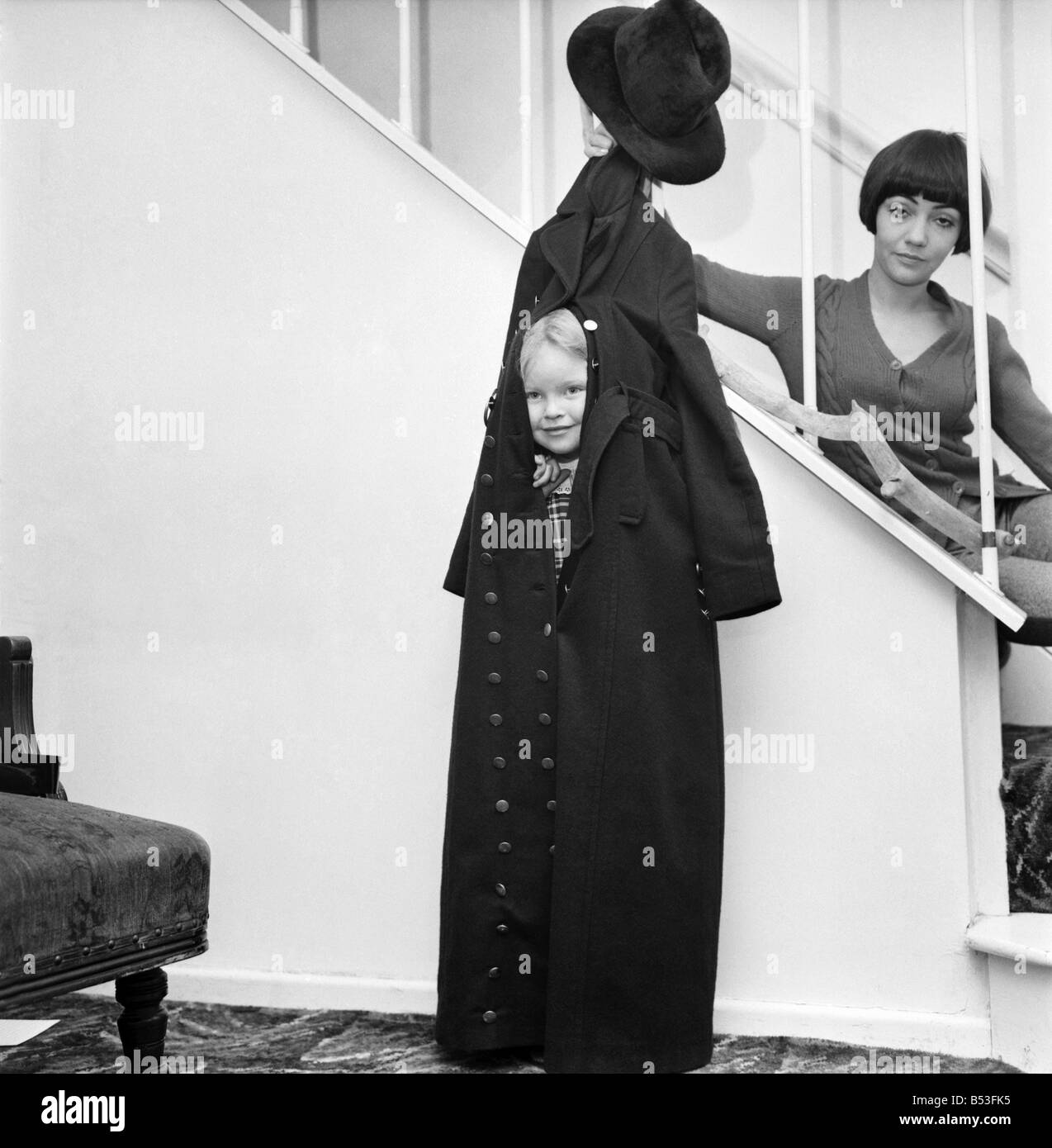 Clothing fashion. Model Ann Coates wearing a maxi coat. December 1969 ...