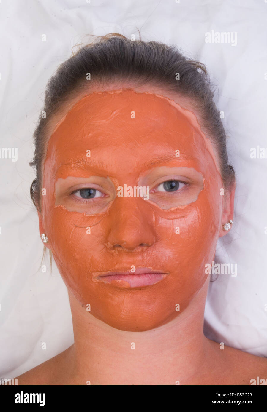 woman with clay beauty mask Stock Photo - Alamy