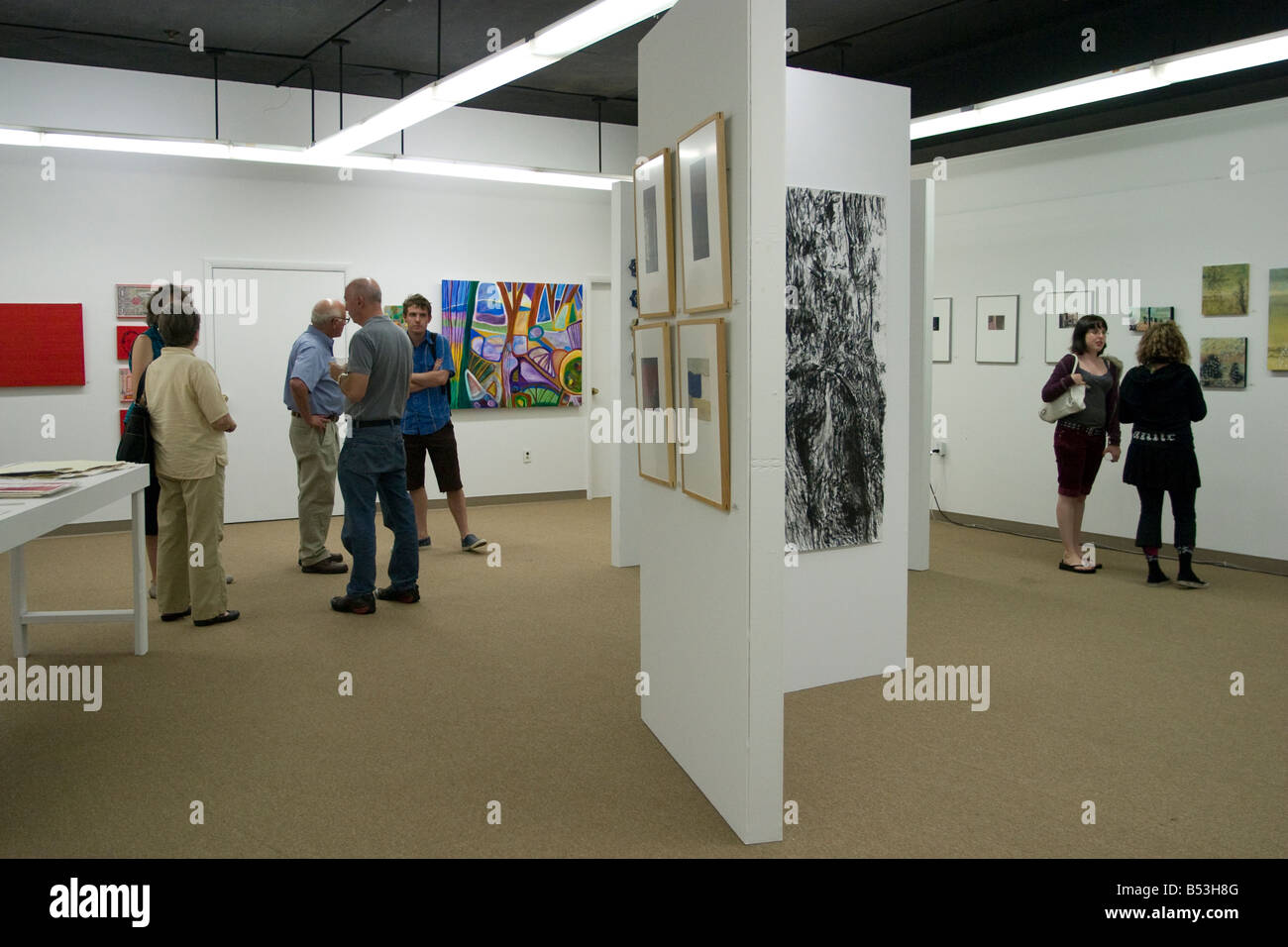 Art opening in a cooperative gallery owned by artists in northern ...