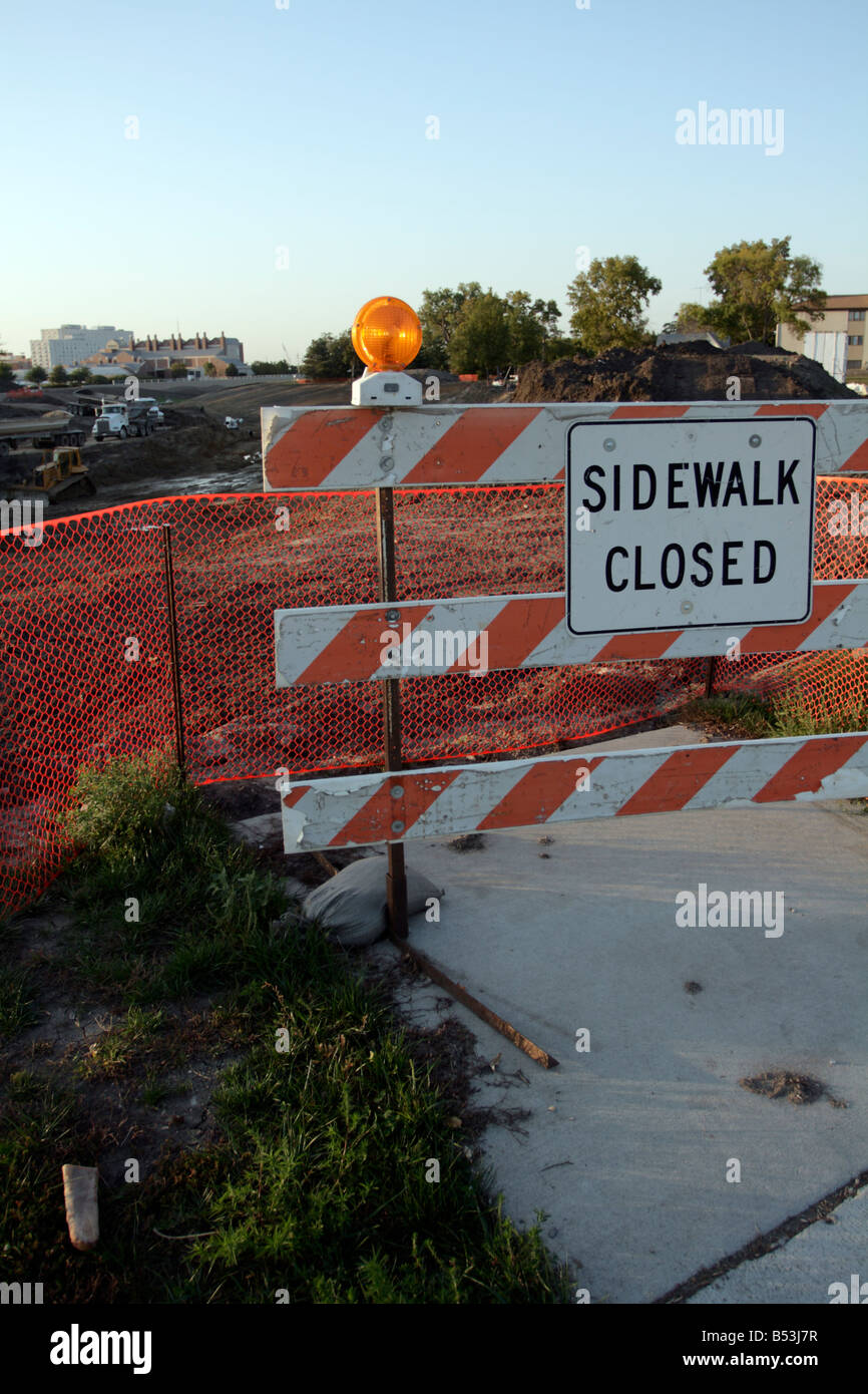 Barricaded closed sidewalk Stock Photo - Alamy
