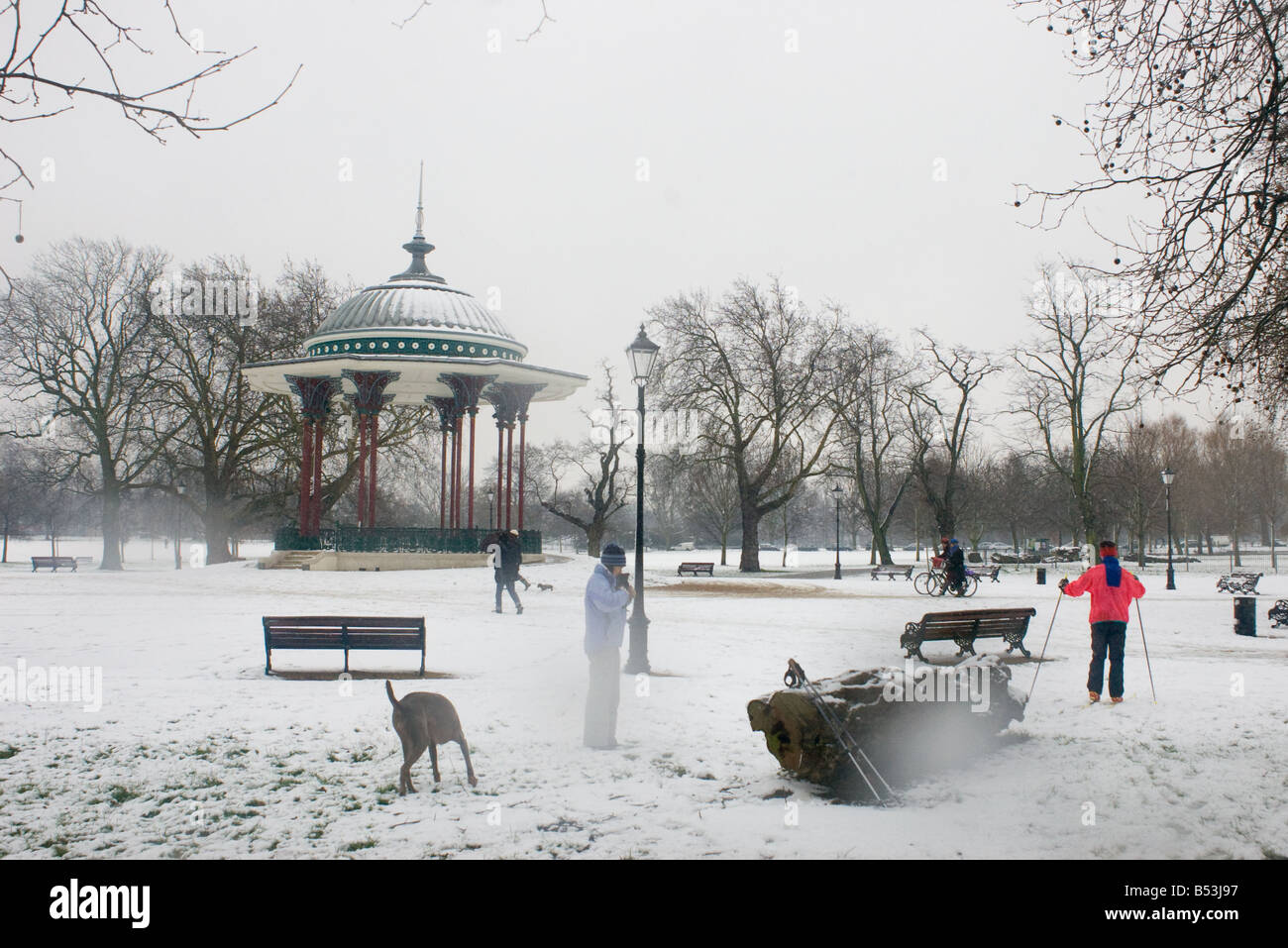 People enjoying snow at Clapham common in winter Battersea Wandsworth ...