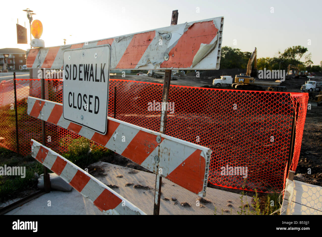 Barrier with a sidewalk closed sign near a construction site Stock ...