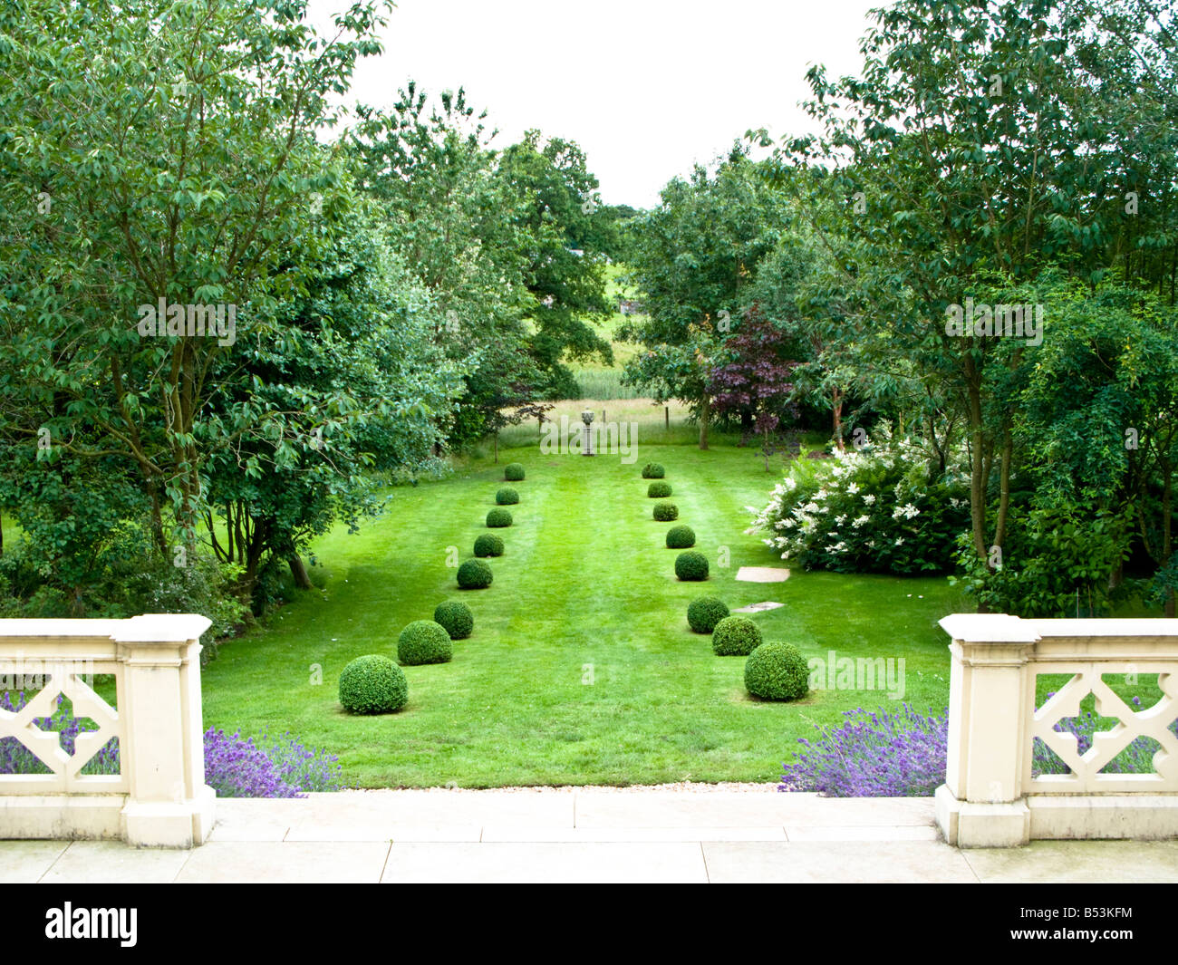 box lined path through a formal garden Stock Photo - Alamy
