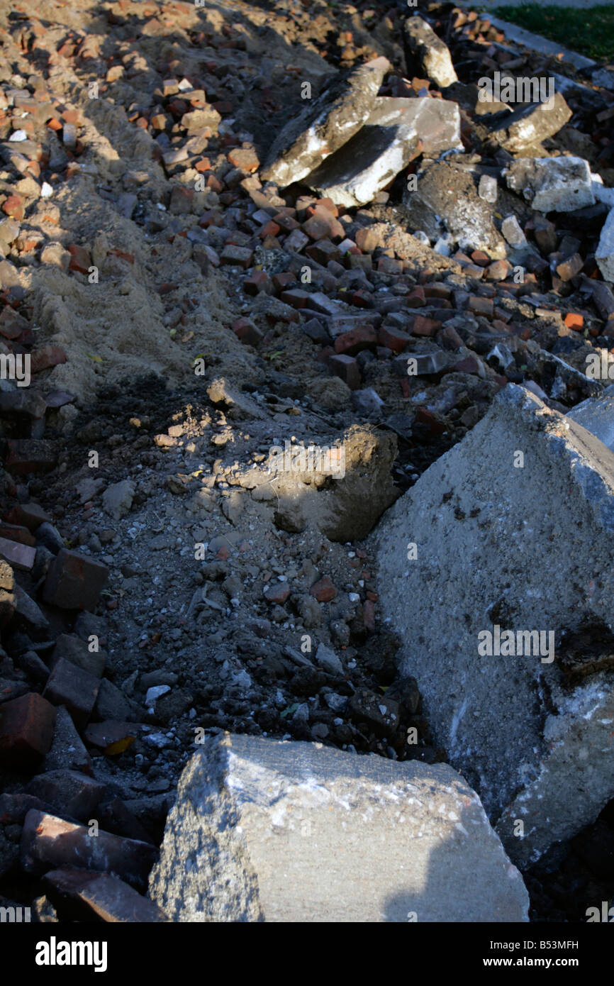 Bricks, sand, and broken concrete chunks Stock Photo - Alamy