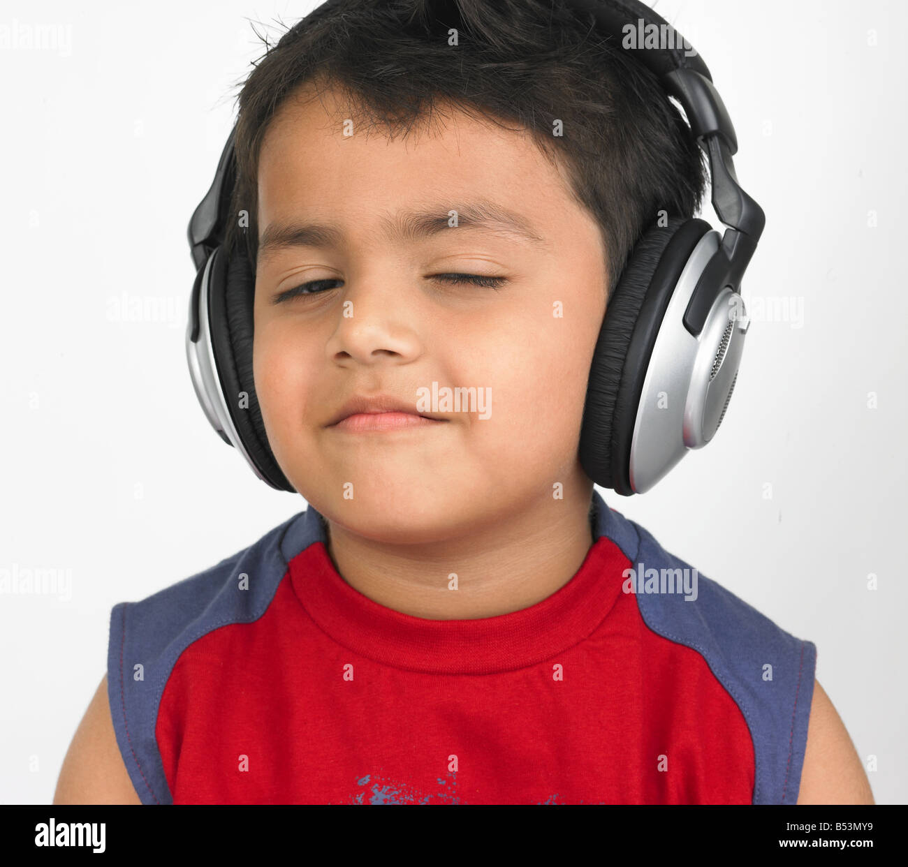 asian boy listening to music Stock Photo - Alamy