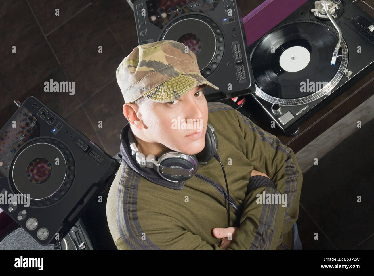 Hispanic DJ performing in nightclub Stock Photo - Alamy