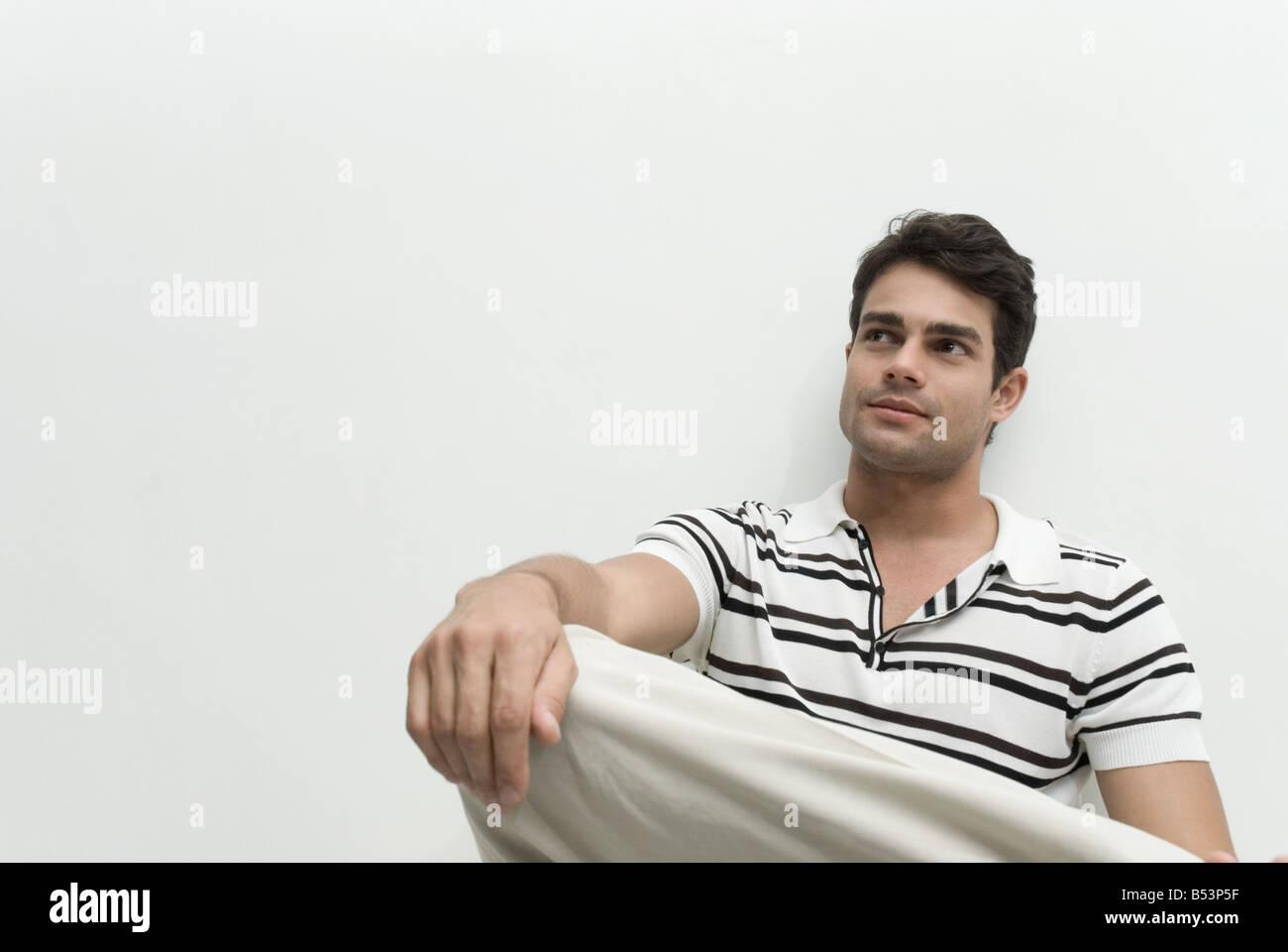Hispanic man relaxing Stock Photo - Alamy
