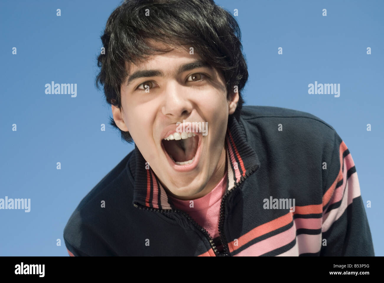 Hispanic man shouting Stock Photo - Alamy