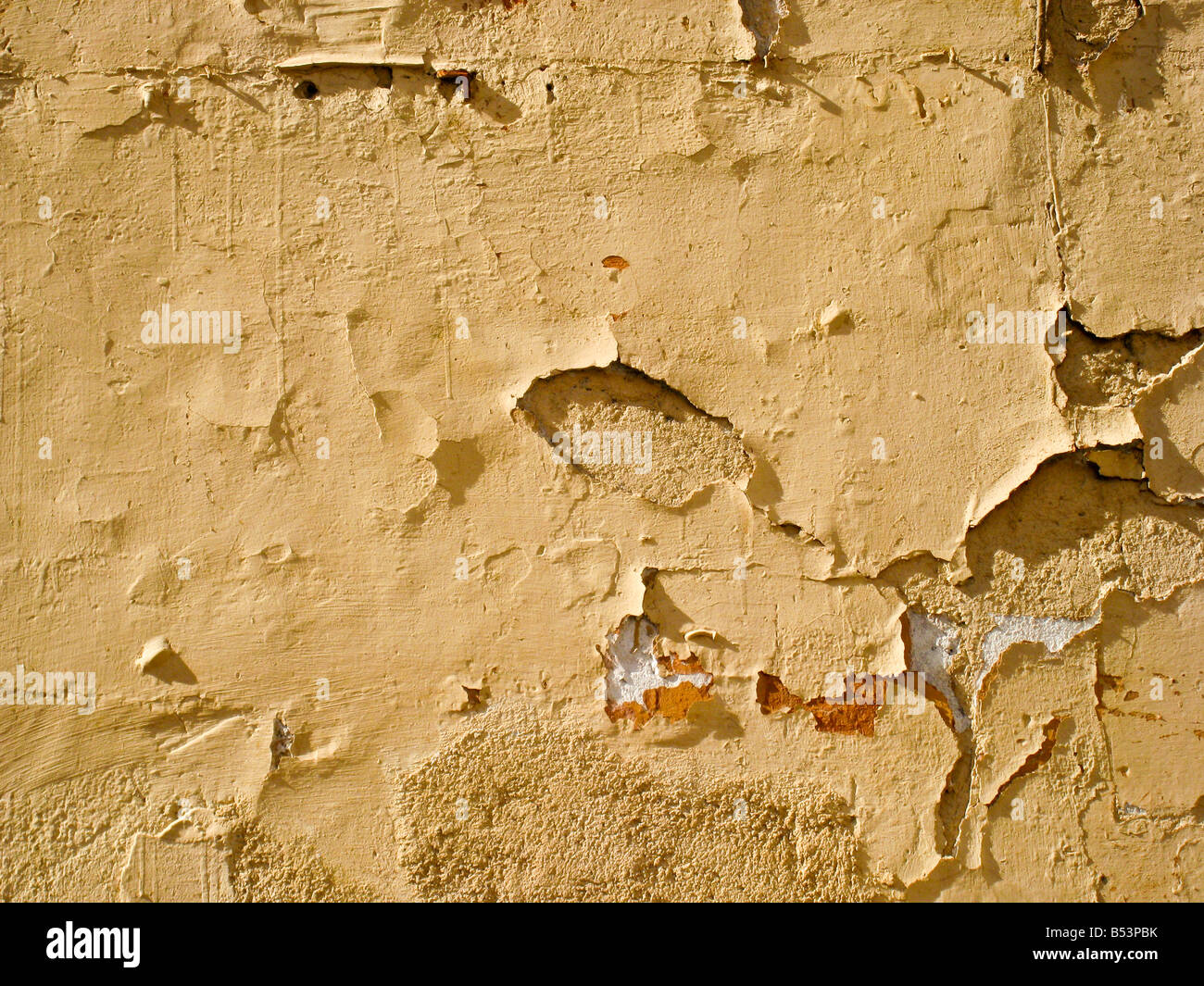 Details of rust coloured old building wall and window shutters at ...