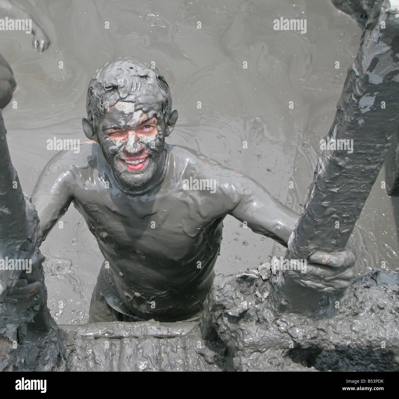 Mud caked smiling hi-res stock photography and images - Alamy