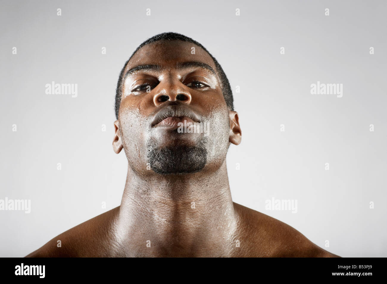 Looking at the camera close up sweating hi-res stock photography and ...