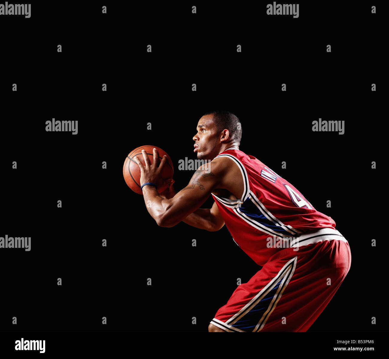 African basketball player shooting basketball Stock Photo - Alamy