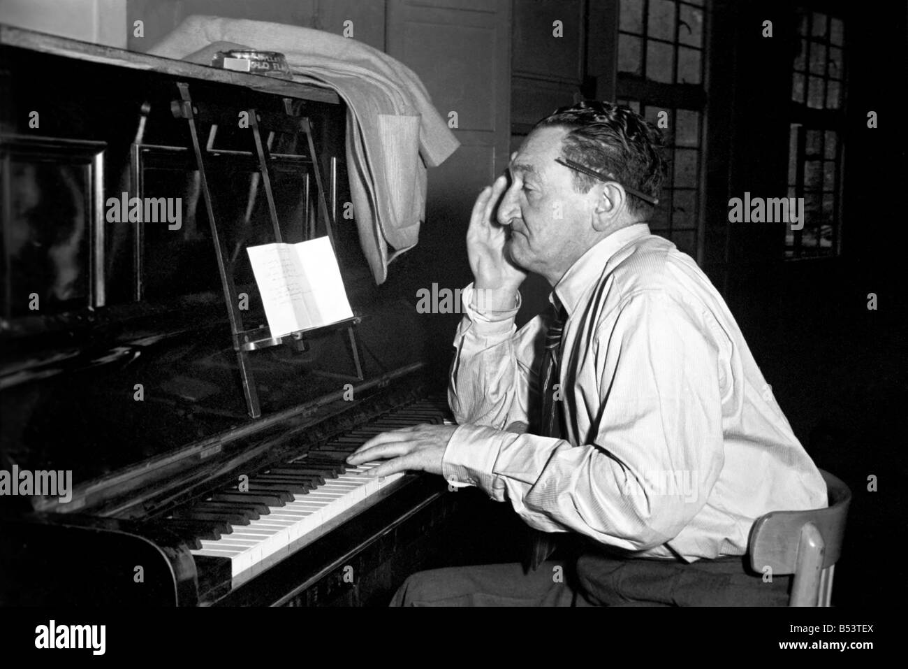 Song writer Harry Leon seen here playing piano. May 1953 D2367-004 ...