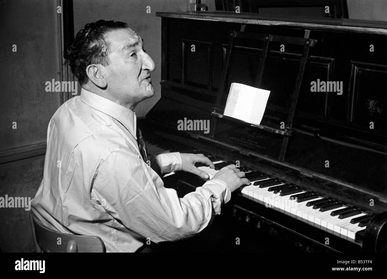 Song writer Harry Leon seen here playing piano. May 1953 D2367-006 ...
